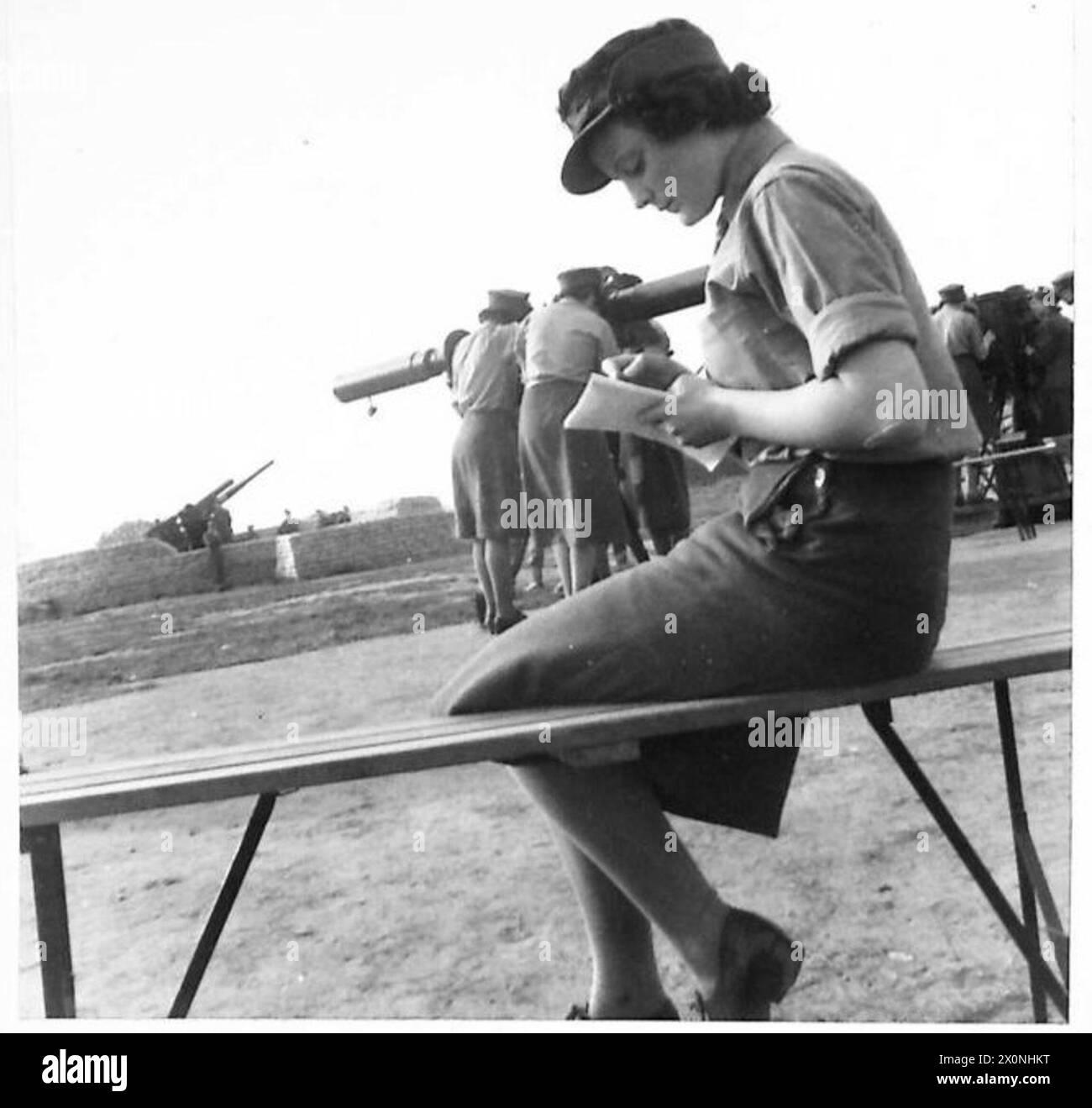 ATS girls operate an anti-aircraft gun site as part of their military ...