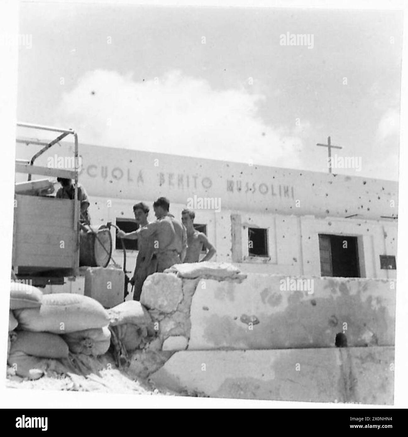 ITALIAN SCHOOL - The battle-scarred walls of the school; and soldiers ...