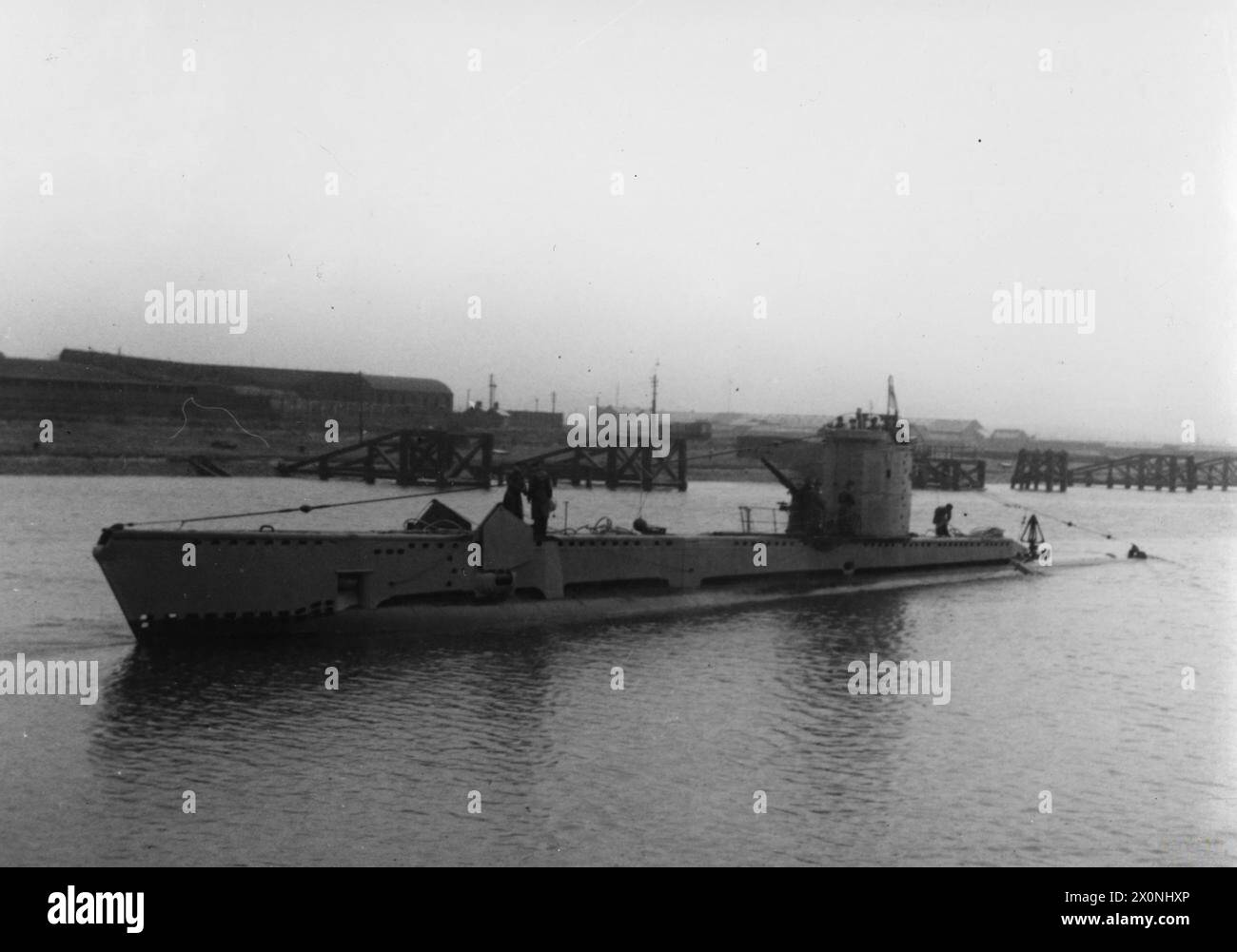HNMS UTVAER - Underway, warehouses visible in the background UTVAER (ex ...