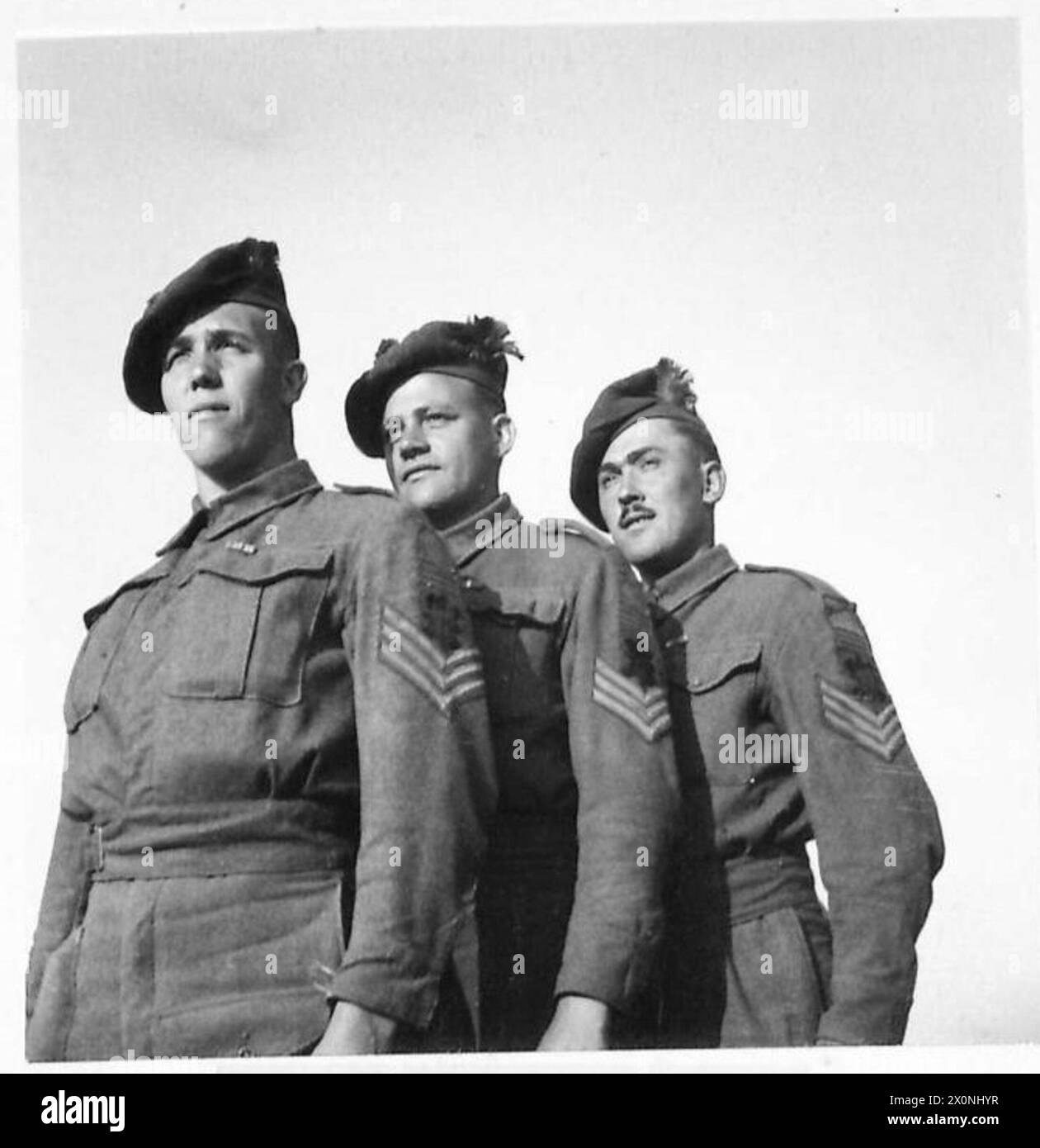 PREPARING FOR THE ATTACK SOUTH OF CAEN - Left to right, Sgt. D ...