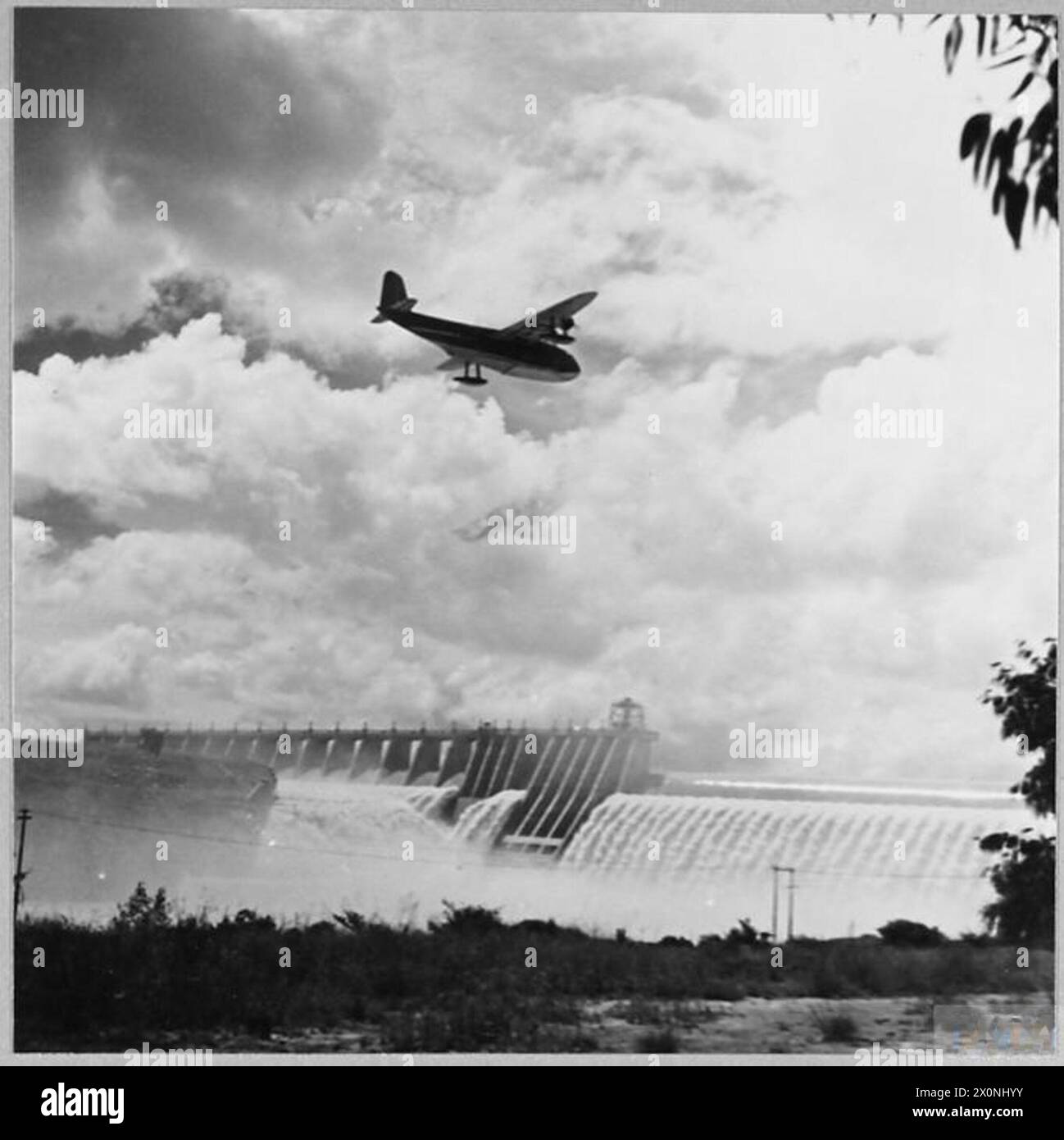 In 1944, a BOAC Empire aircraft flies over the Vaal River dam near ...