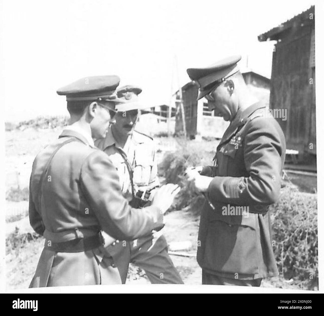 Colonel F. Faberi, Italian Commandant, shows British officers the ...