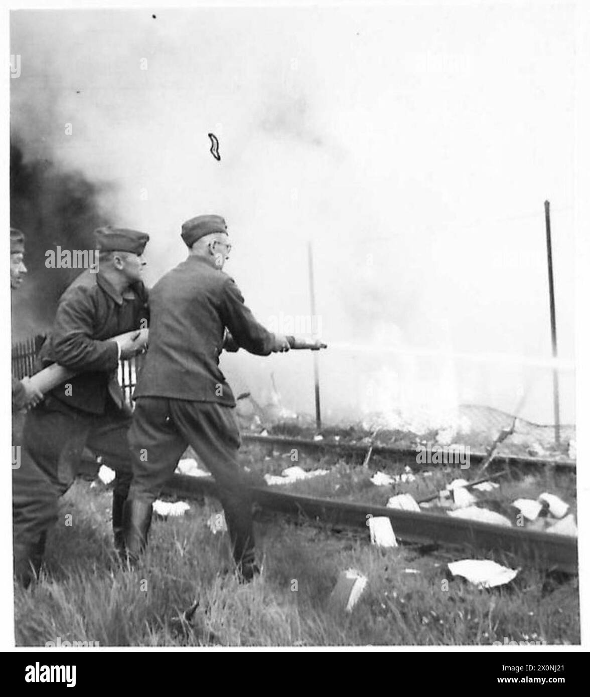 ARMY FIRE SERVICE IN ACTION AT LUBECK - More scenes showing men of Army ...
