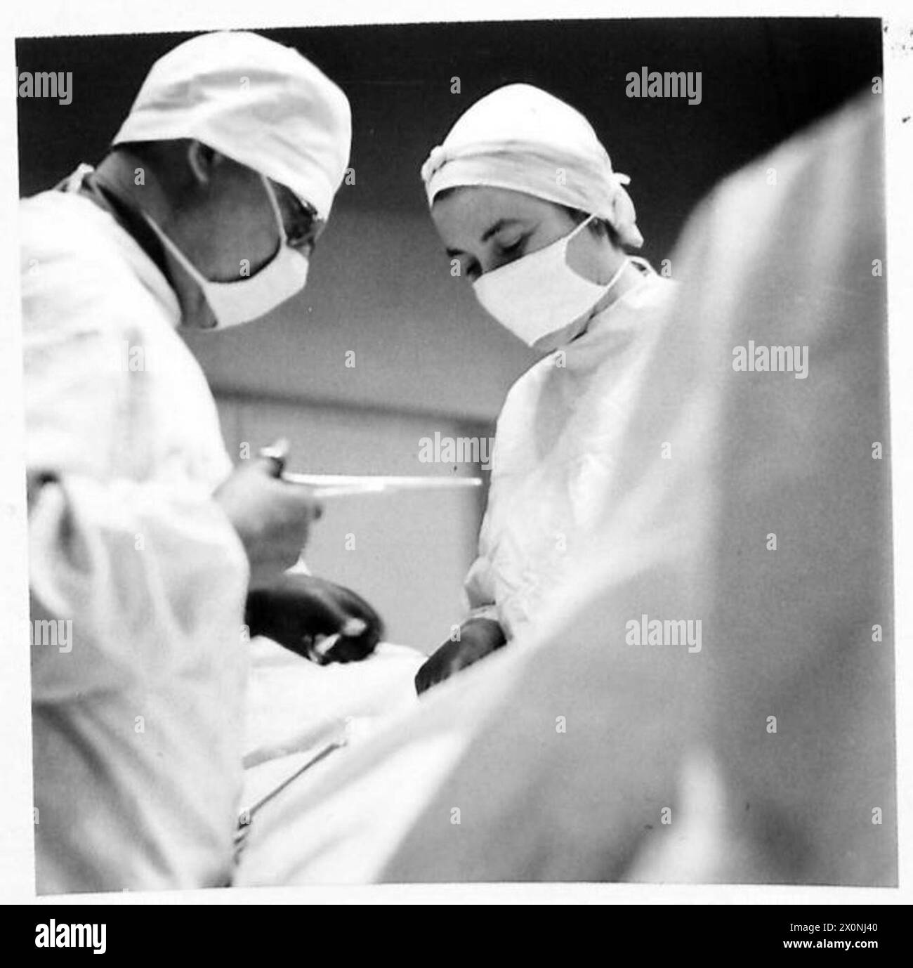 A GENERAL HOSPITAL IN ITALY - Doctors and orderlies are seen carrying ...