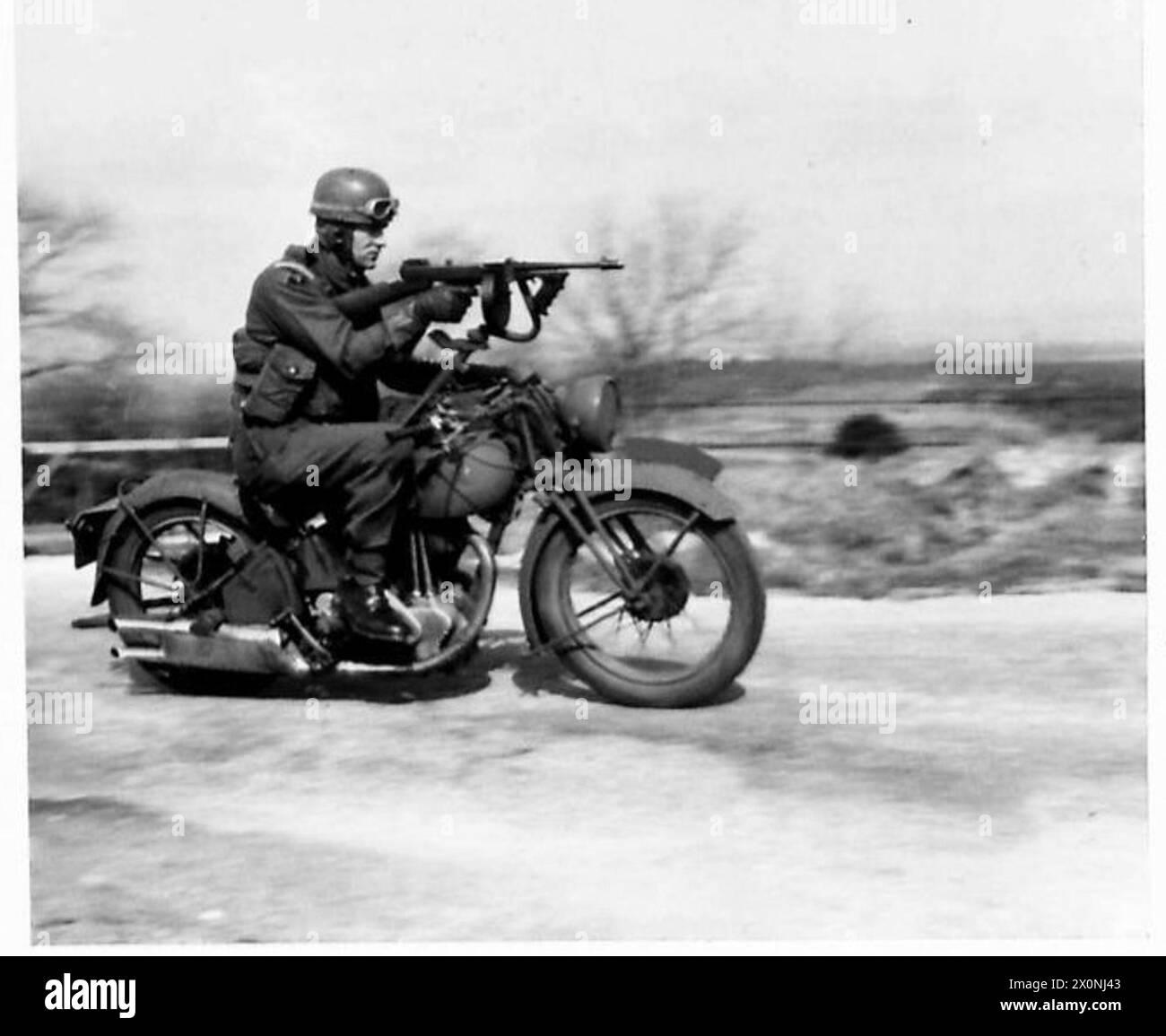 TOMMY GUN MOTOR CYCLISTS - A guardsman on his Tommy gun equipped motor ...