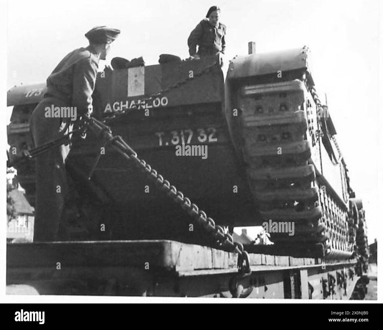 Armoured tanks are being loaded onto trains at Marlborough Goods ...