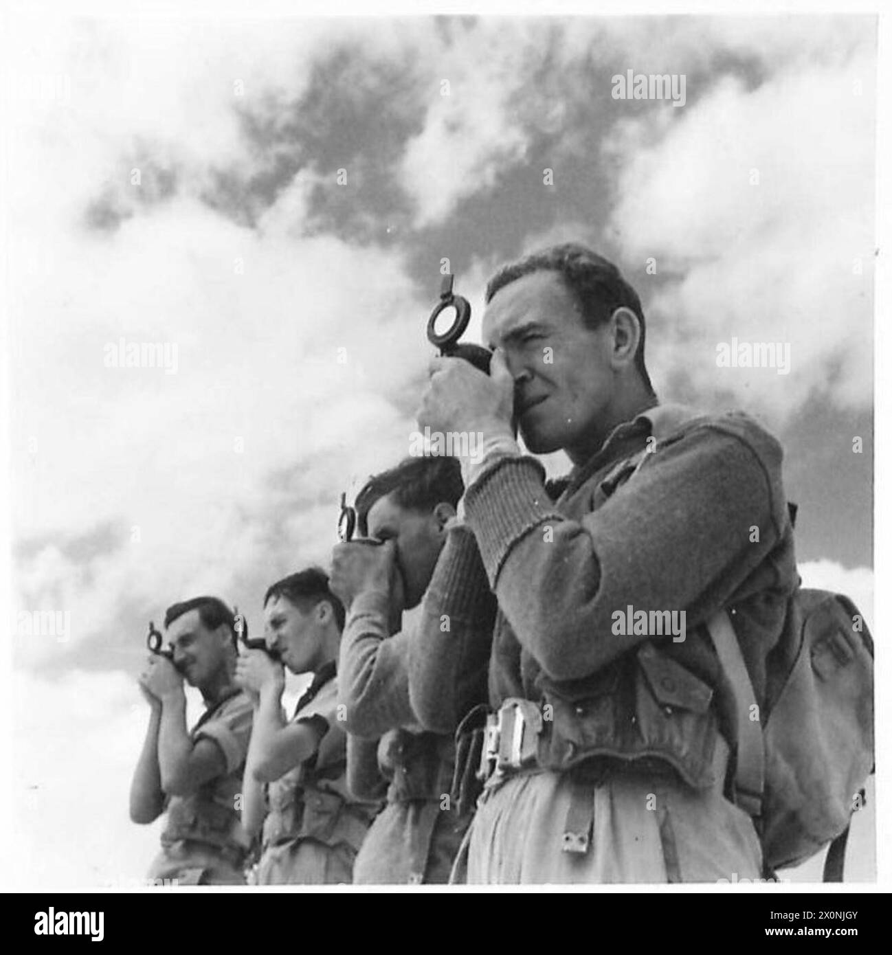 A class receives instruction in map reading and the taking of compass ...