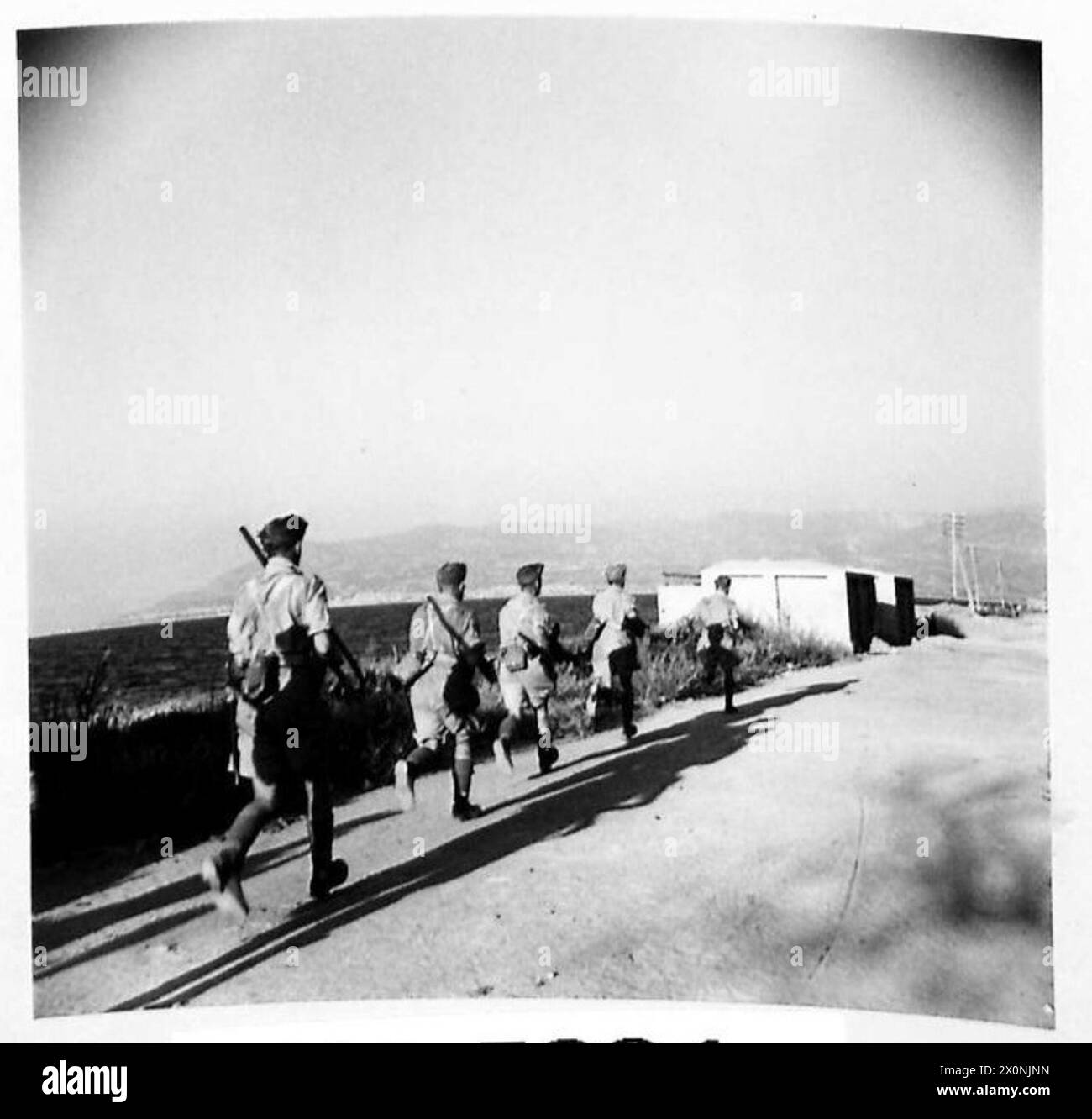 8TH ARMY ENTERS MESSINA - Men of the East Yorks Regiment running to ...