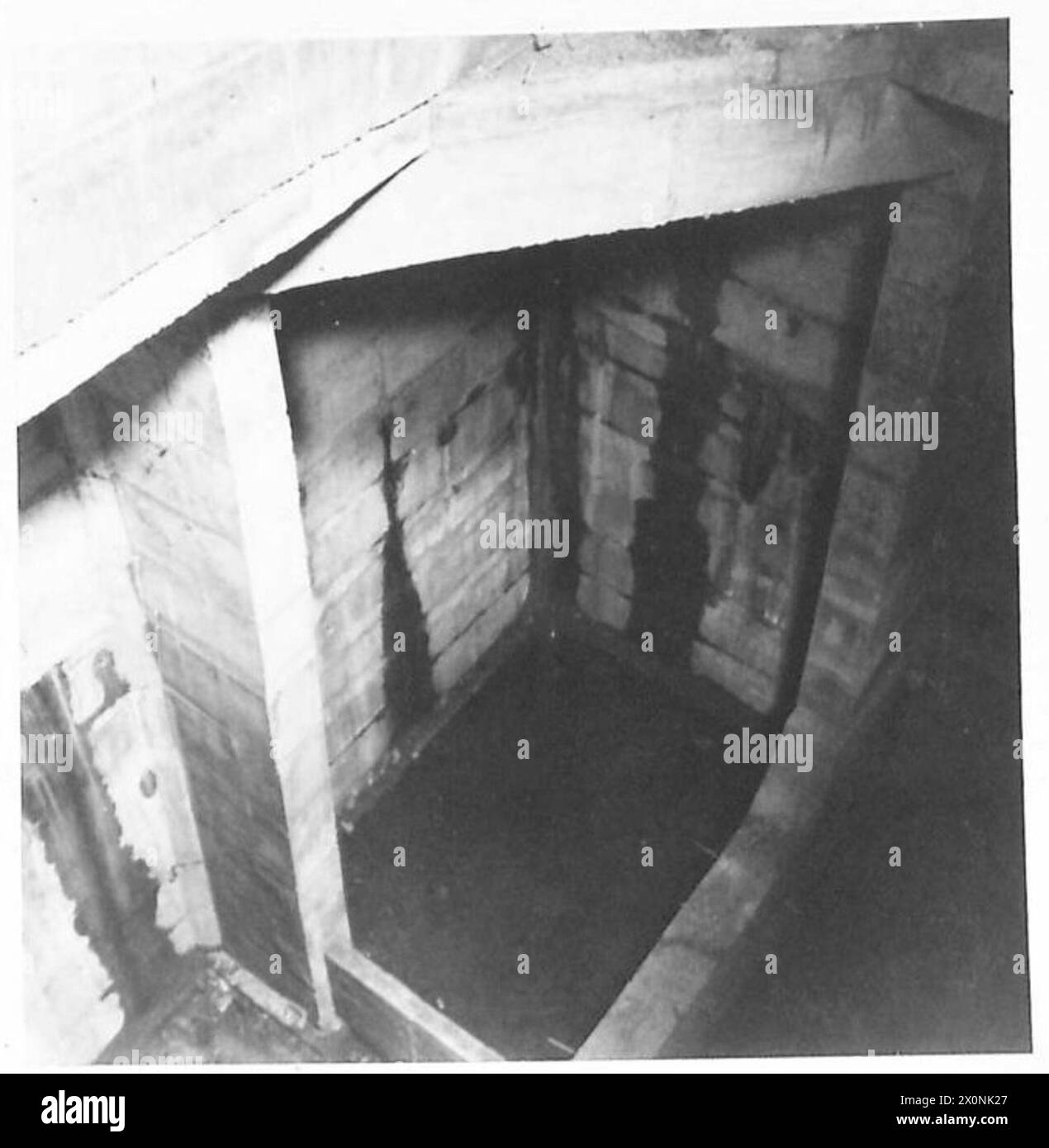 Photographs at Victoria Docks and West India Docks show the ...