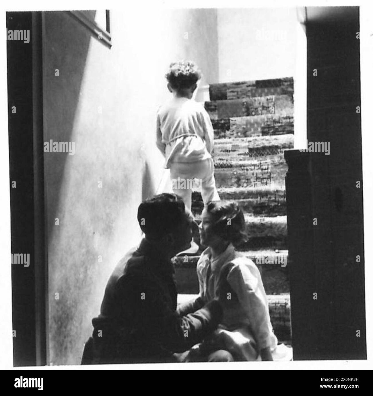 AN EIGHTH ARMY MAN ON LEAVE - Good-night to the kiddies, Randall goes ...