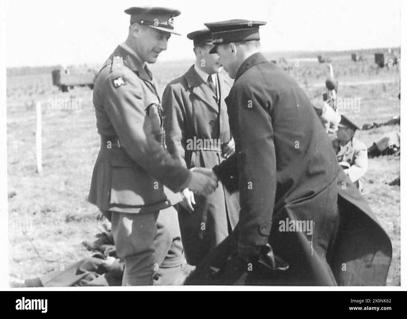 ARMY SEES NEW PLANES - Lt.Gen. Anderson greeting members of the British ...