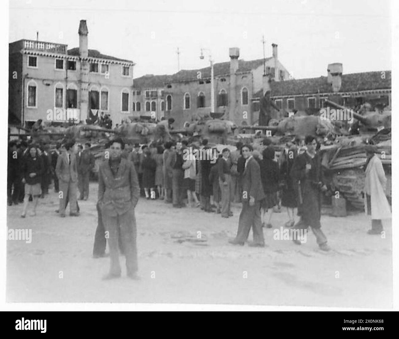 British Eighth Army troops enter Venice in the evening, with local ...