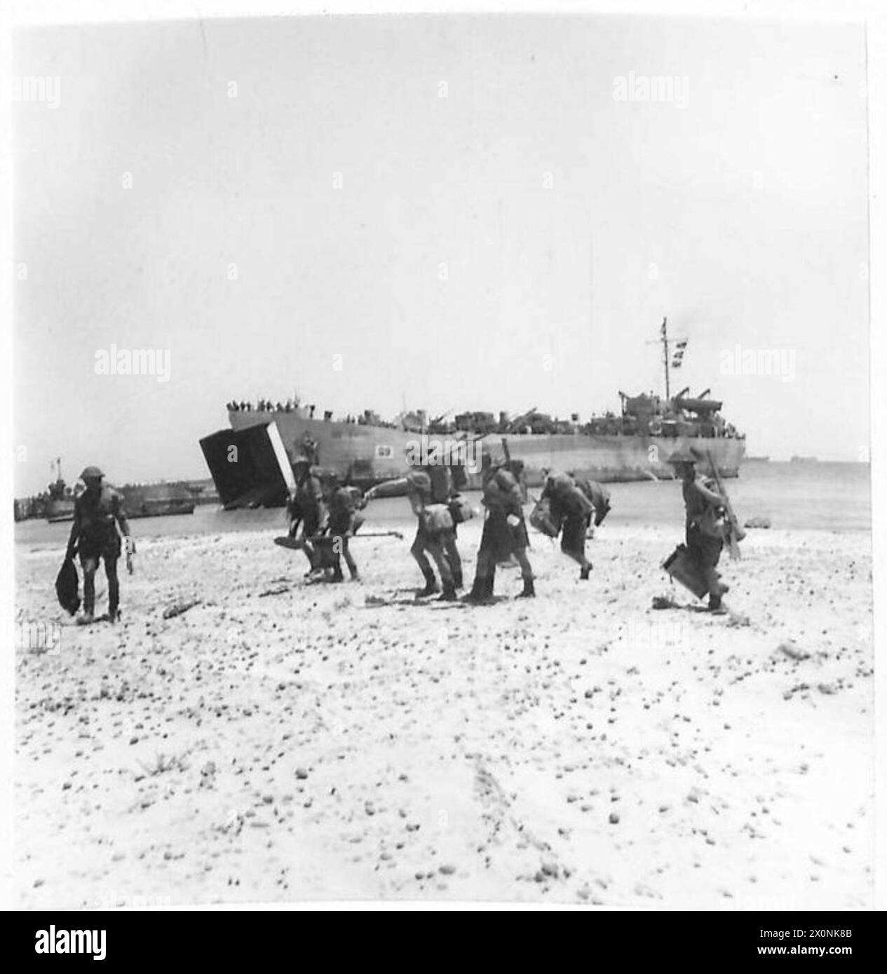INVASION OF SICILY : FIRST PICTURES - Infantry wading ashore from ...