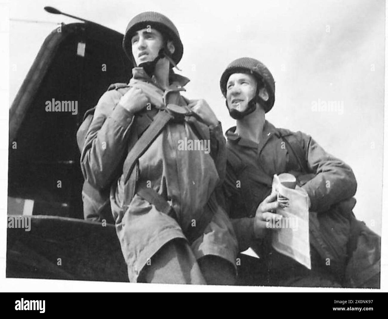 PARATROOPS IN TRAINING - Paratroops fully dressed and ready to emplane ...