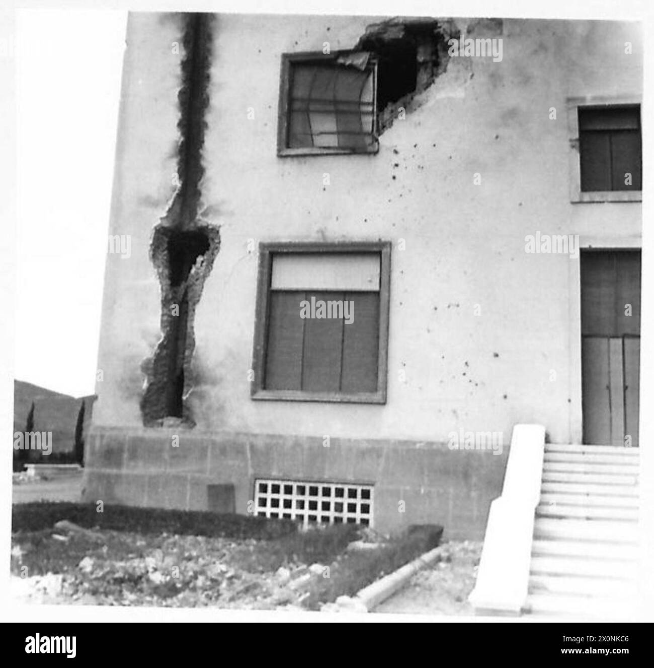 Rocket holes are visible in the Royal Palace at Tirana, with interior ...