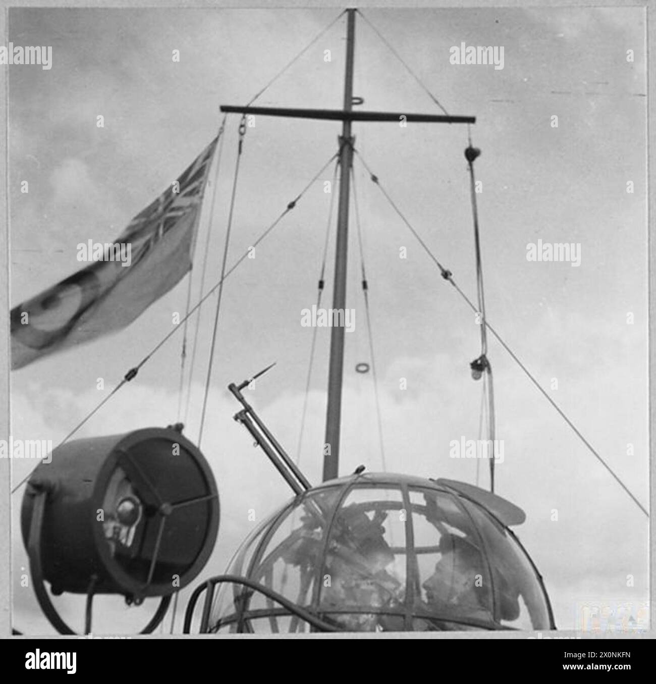 One of the two gunners aboard an RAF air/sea rescue launch during a ...