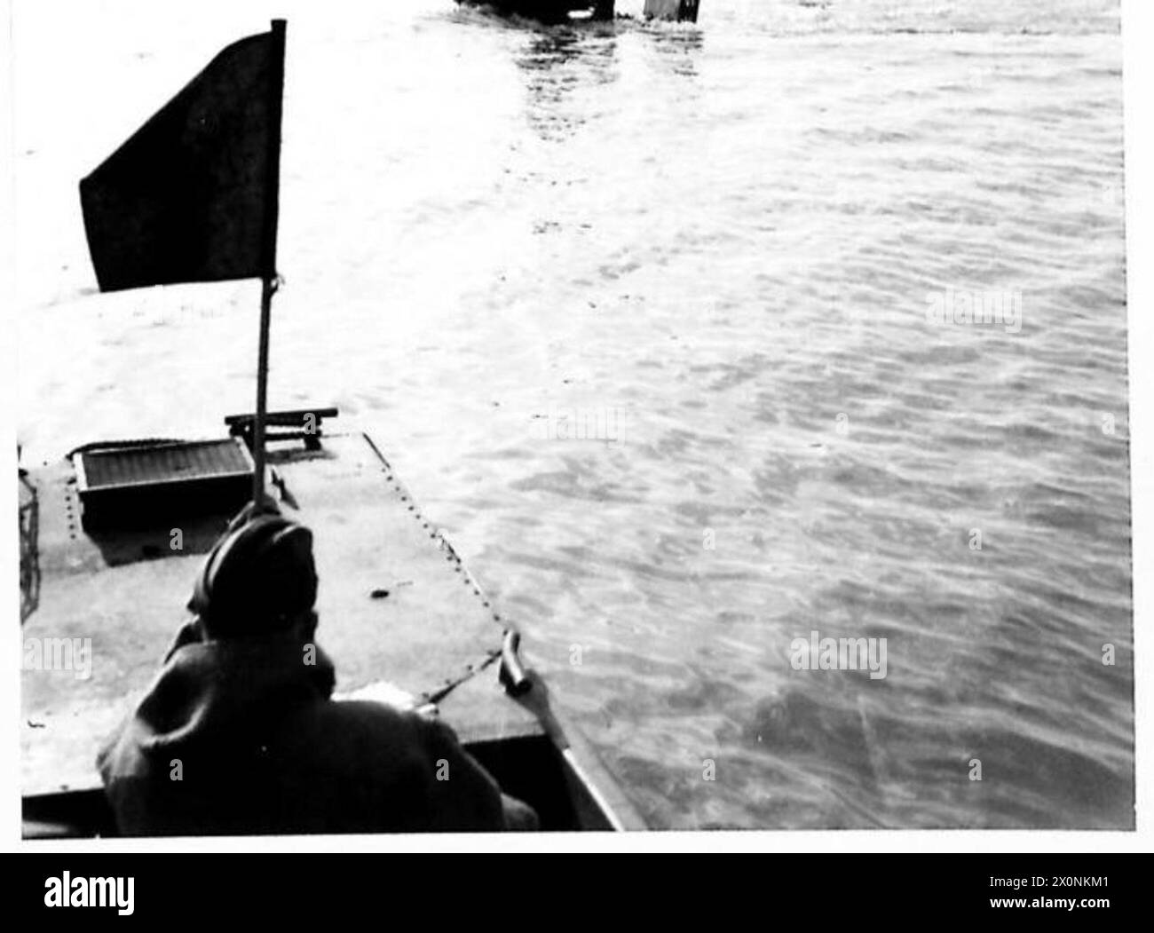 A British Army time-keeper signals the end of a six-minute wading trial ...