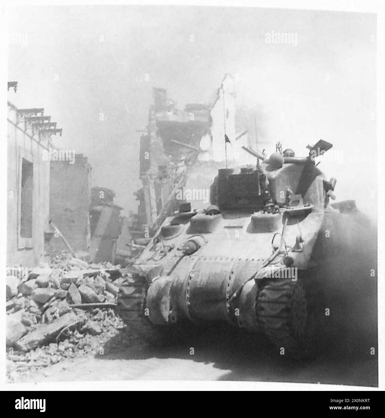 SICILY : FALL OF REGALBUTO - Canadian Sherman tanks passing through the ...