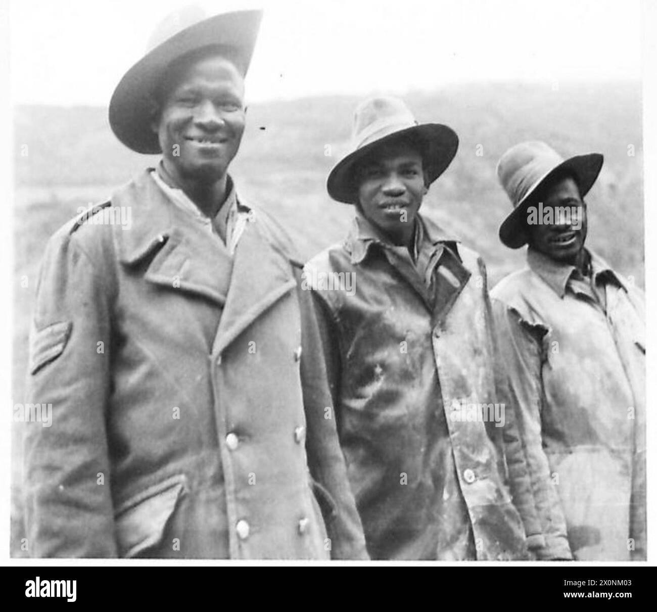 FIFTH ARMY : VARIOUS - Three cheerful Bechuana soldiers. Left to right ...