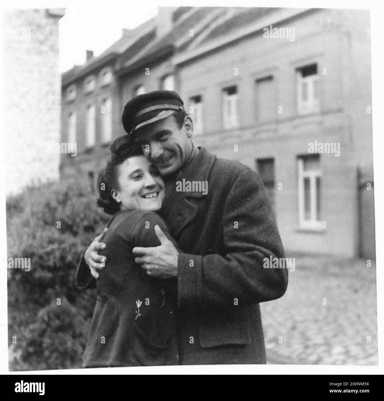 Gustaff reunites with his wife outside their home after five years of ...