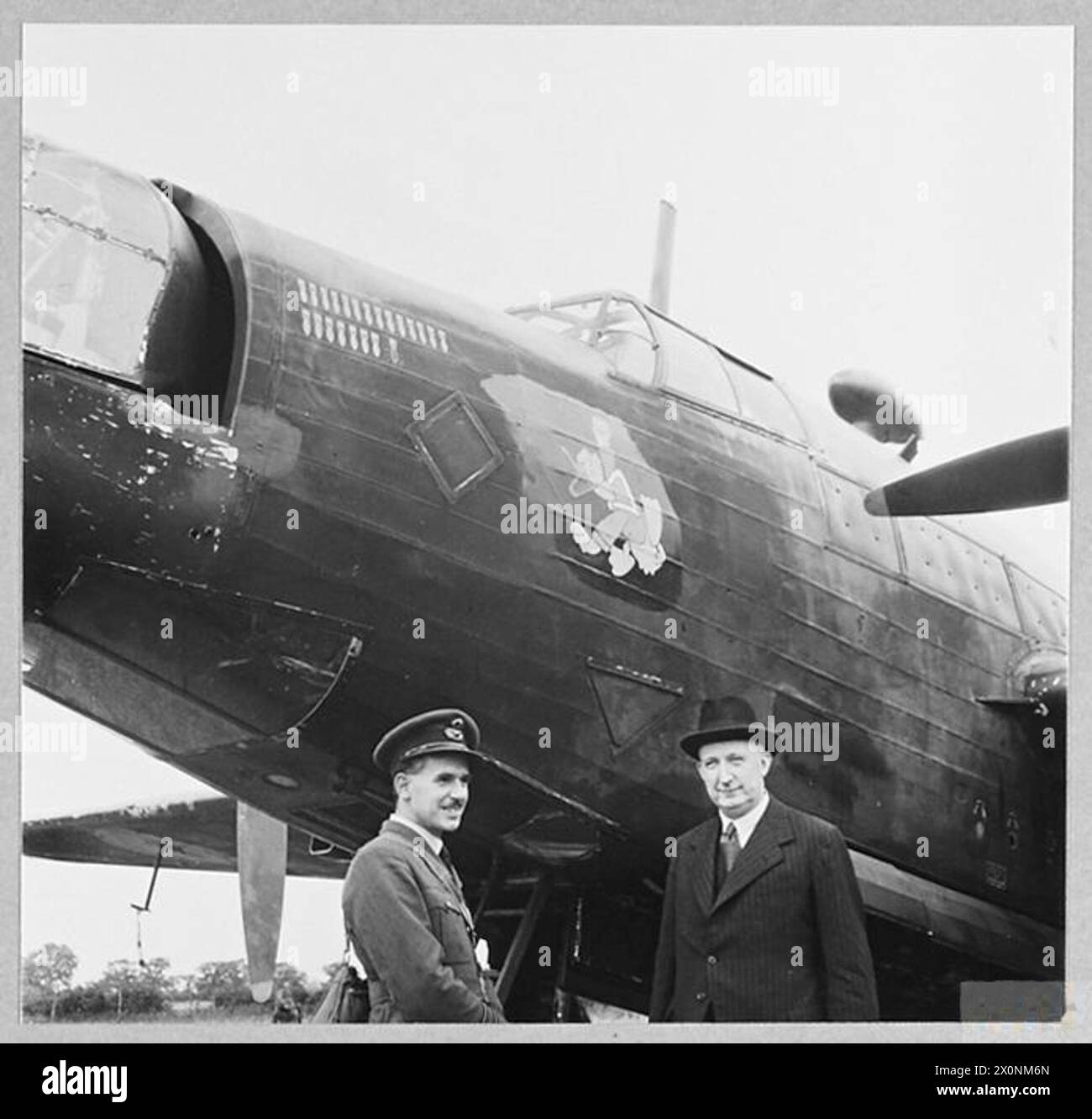 SIR ALAN BURNS AMONG BOMBER CREWS - A fighting "Donald Duck" decorates ...