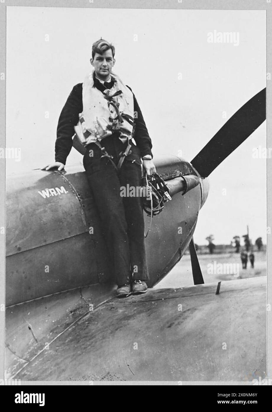 PILOTS OF THE R.A.F. MOTOR INDUSTRIES SQUADRON WITH THEIR PLANES ...