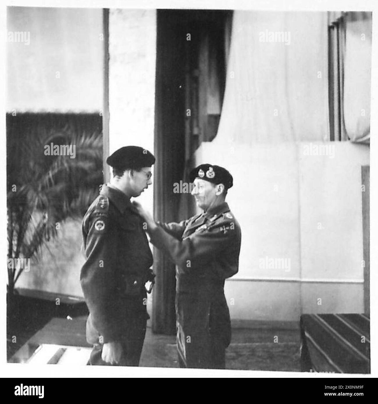 8th ARMD BDE INVESTITURE - Capt. T.G. Cameron, RAMC, receives the MC ...