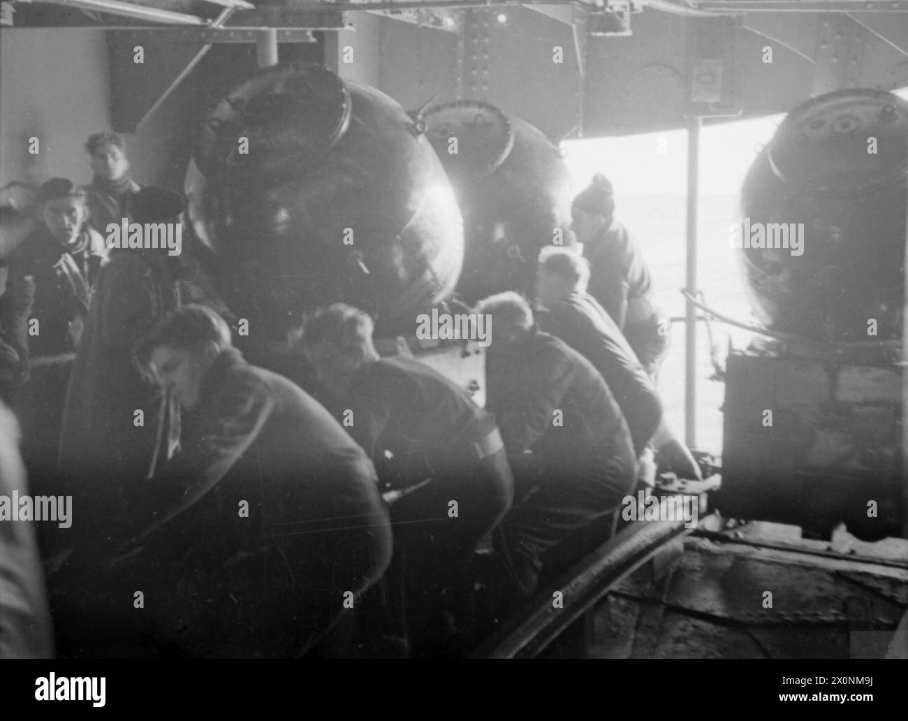 MINELAYING. 1942, ON BOARD A BRITISH MINELAYER, AT KYLE LOCHALSH ...