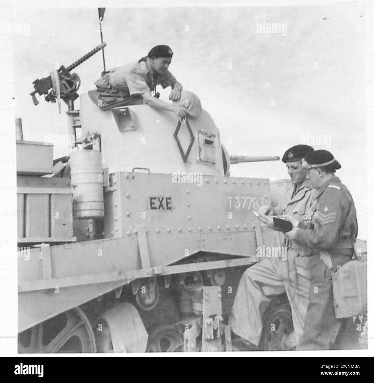 THE ARMY FILM AND PHOTOGRAPHIC UNIT - A Sergeant Cameraman with members ...