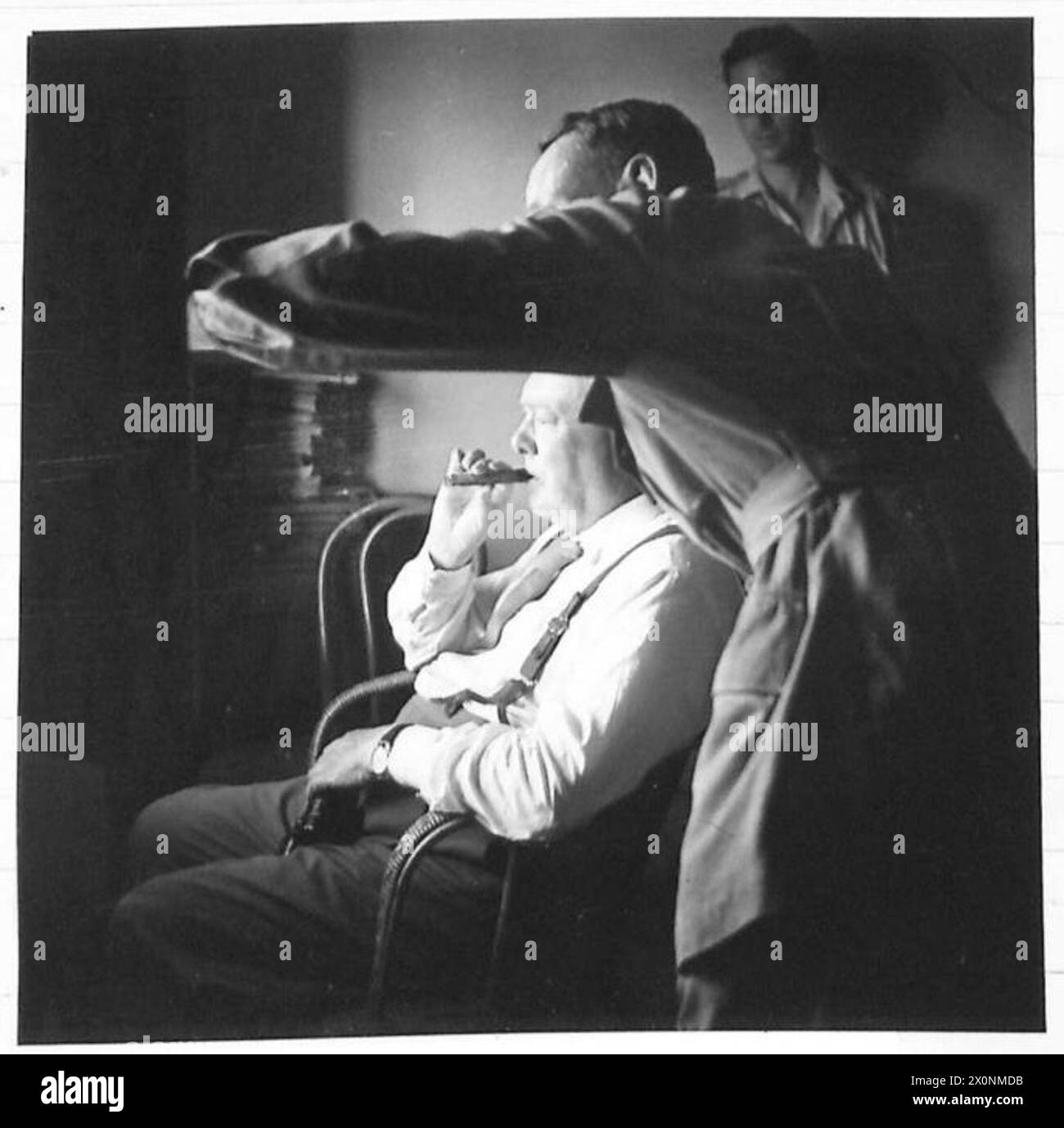 Photographic negative of the Prime Minister at a forward observation ...