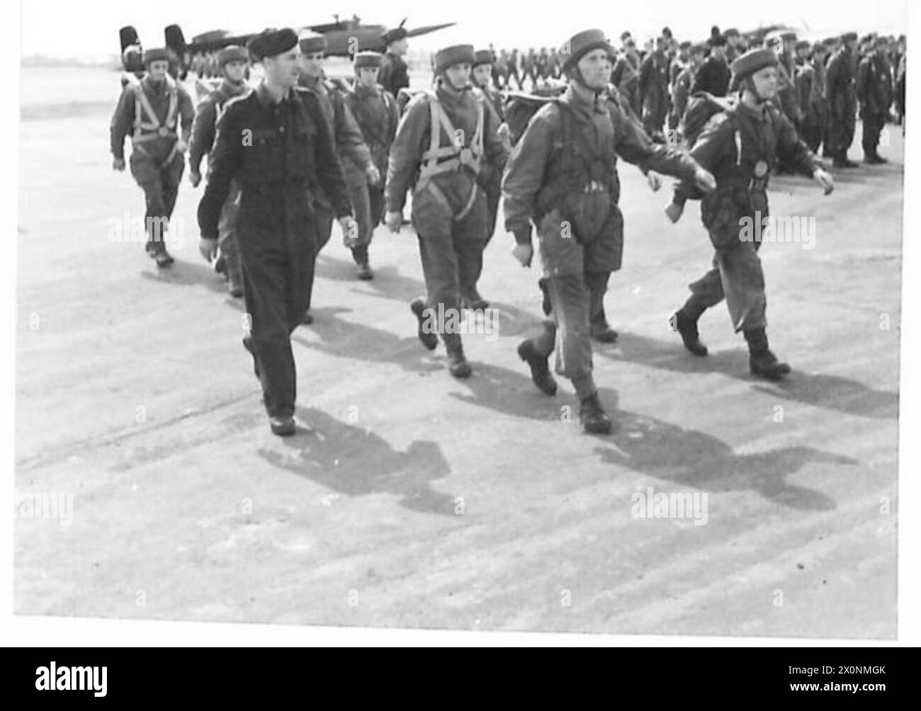 PARATROOPS IN TRAINING - With RAF instructors, recruits march to the ...