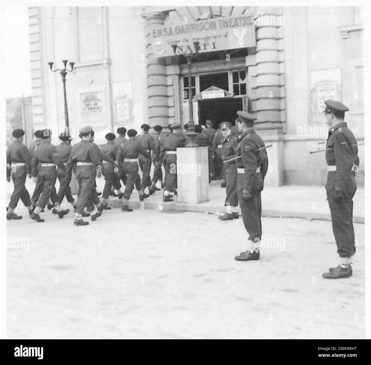 CHURCH PARADE AT PESARO - Troops of the 4 Hussars entering the E.N.S.A ...