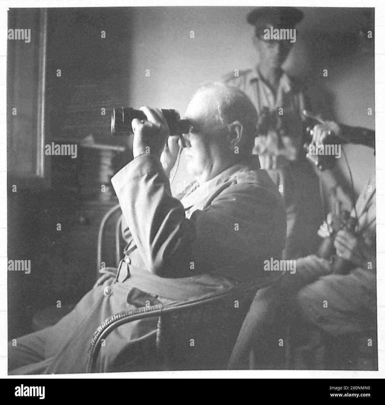 The Prime Minister observes artillery fire from a forward Observation ...