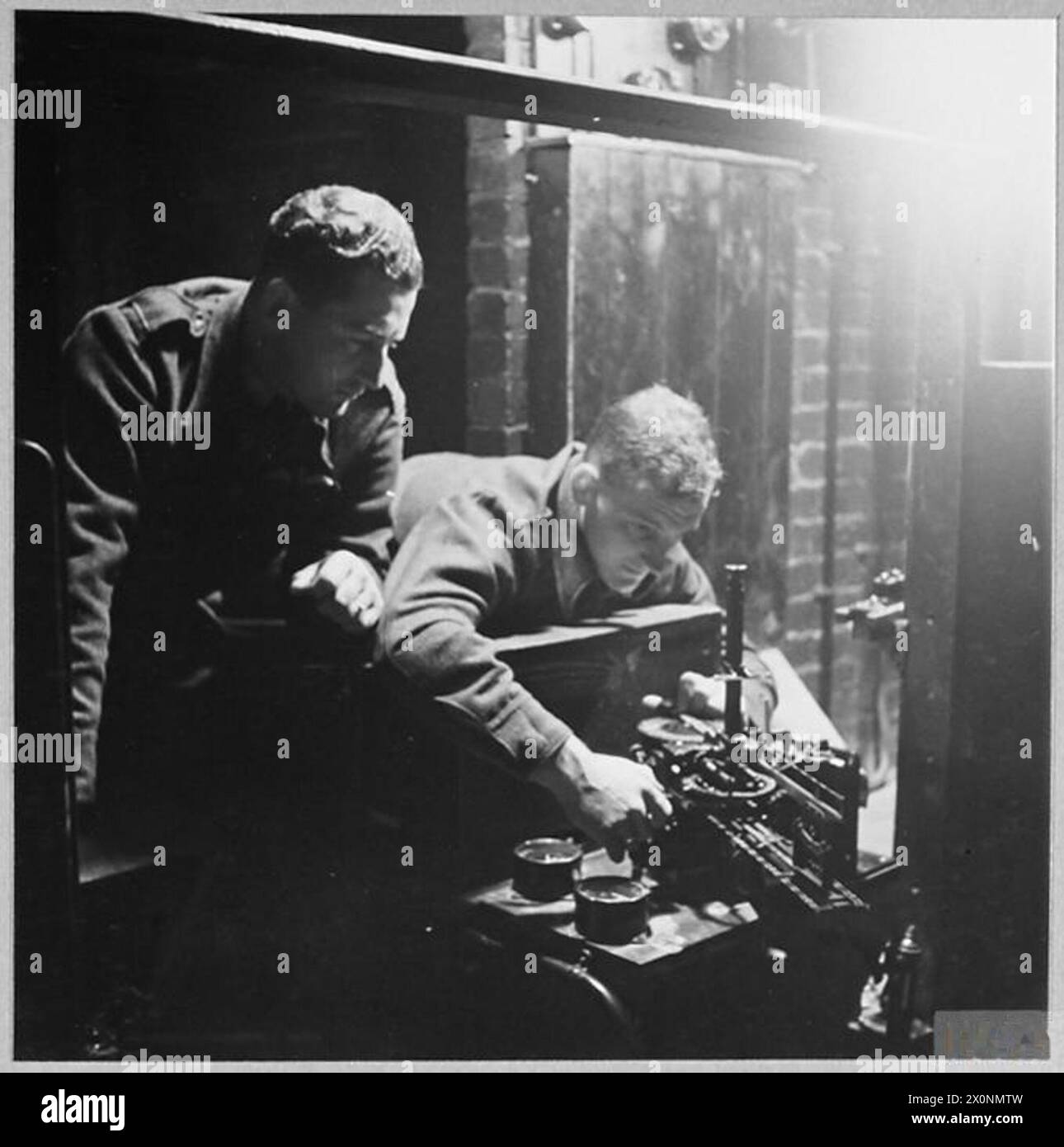 R.A.F. BOMBER PILOTS IN TRAINING. - Picture issued 1942. For story see ...