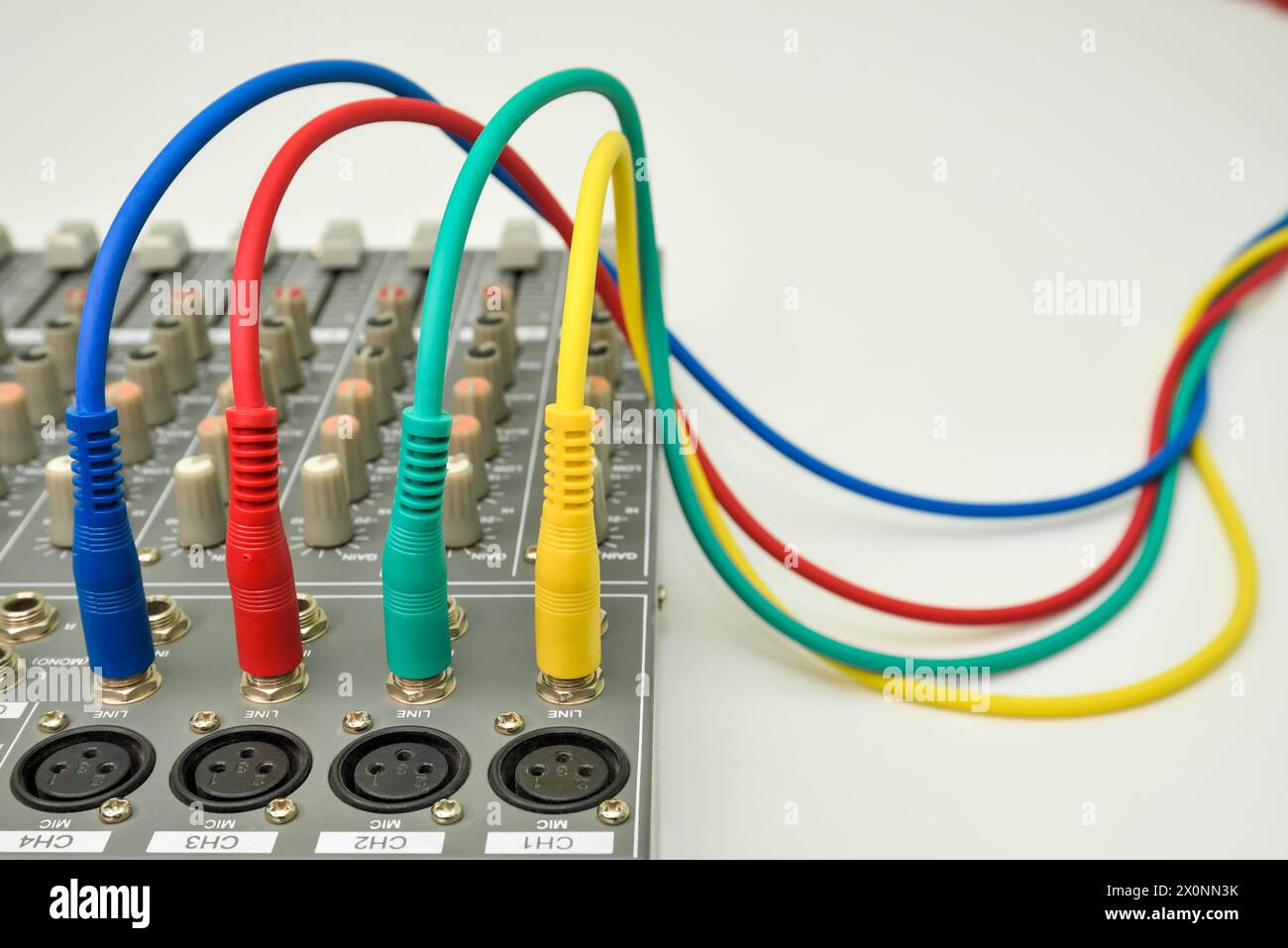 Audio jack plugs on music mixing console for connecting music devices ...