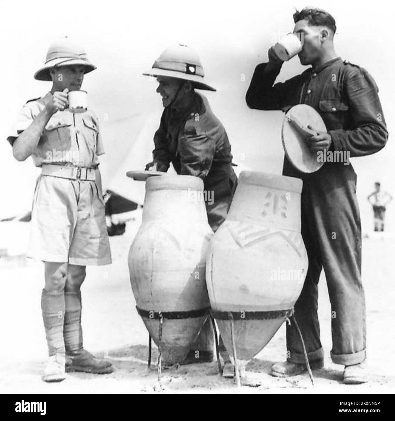 Infantry troops receive water from Goolahs during desert training ...