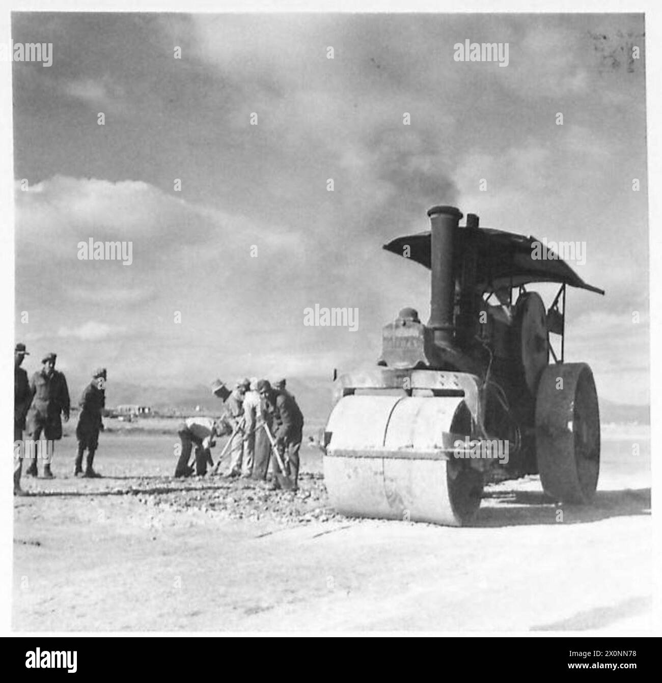 FIVE HOURS IN CRETE - Civilians help to repair the runway at Iraklion ...