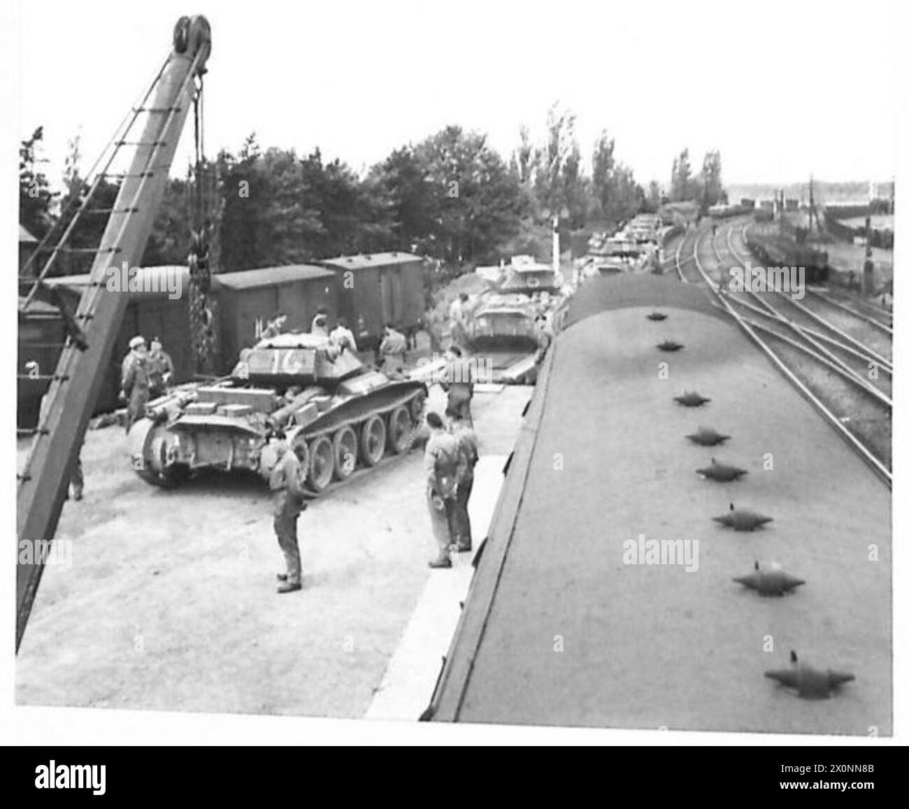 Tanks are loaded onto transport for deployment in the Eastern Command ...