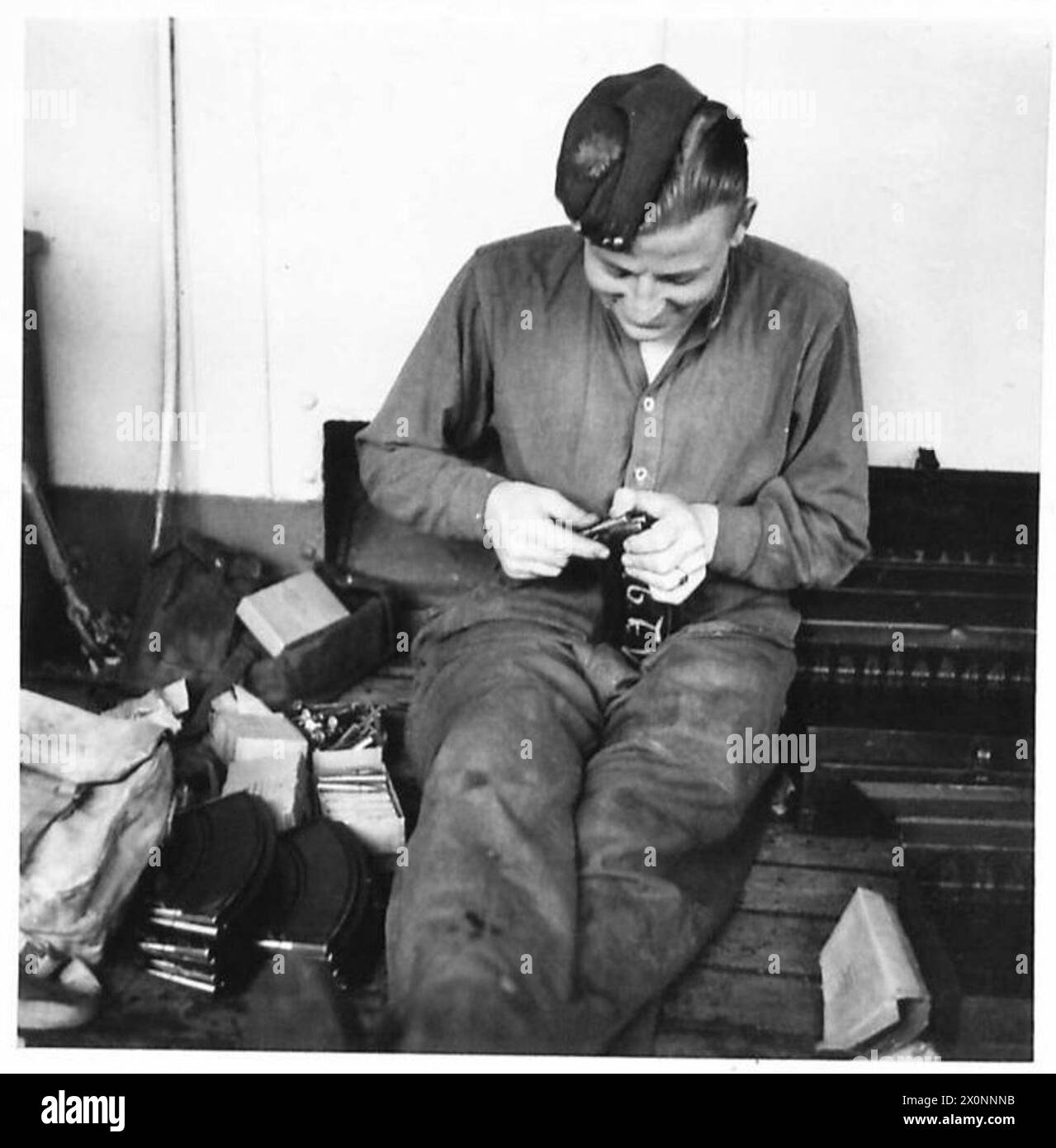 Soldier loading gun in Cut Out Stock Images & Pictures - Alamy