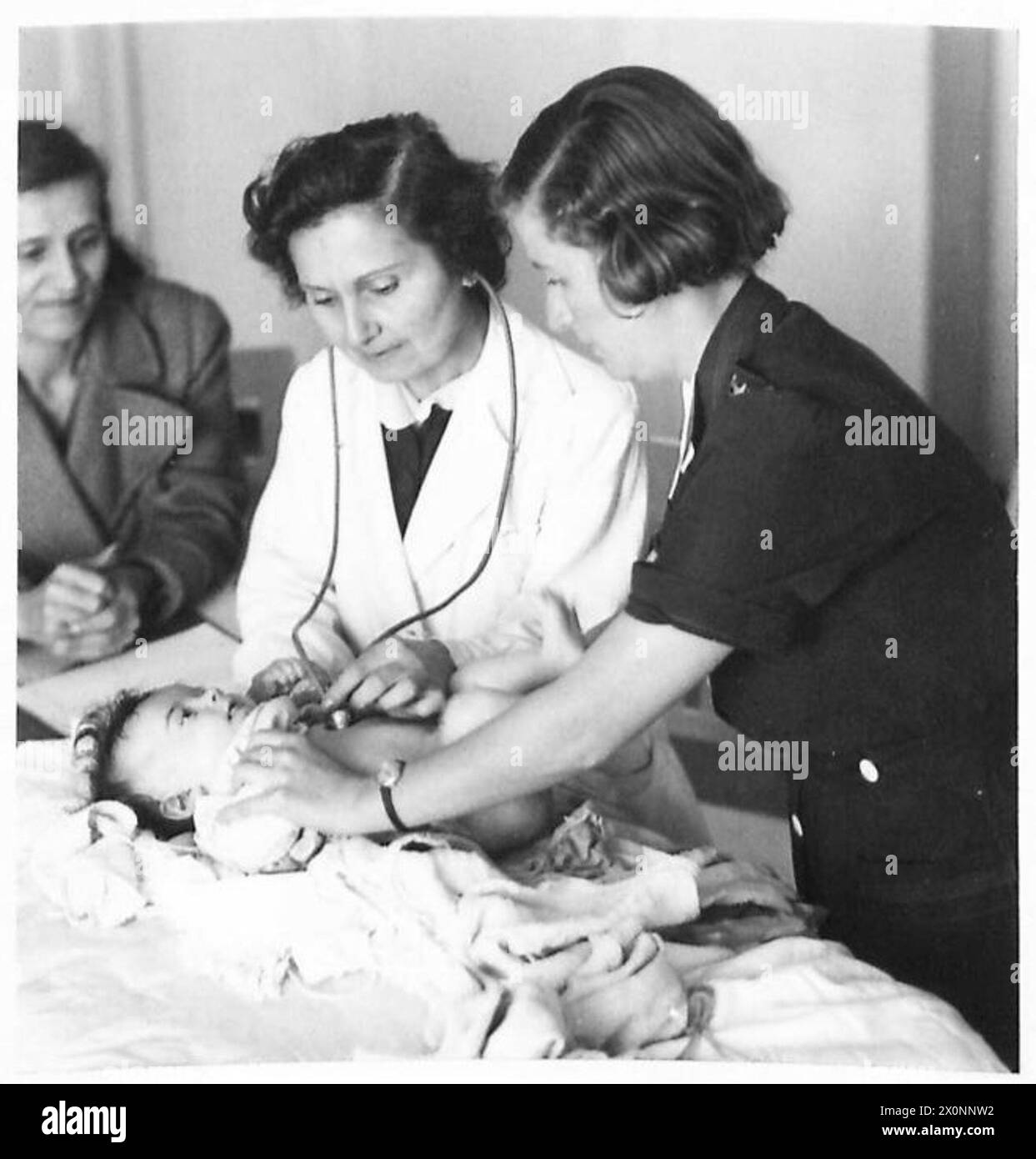 Miss Elsie Stevenson, a health visitor with the British Red Cross, and ...