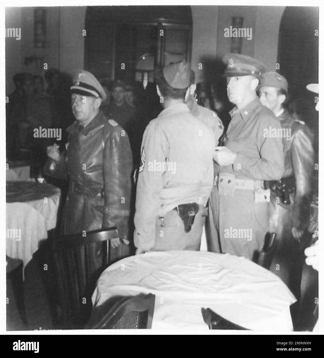 A German S.S. Colonel addresses fully armed troops surrounded in Milan ...