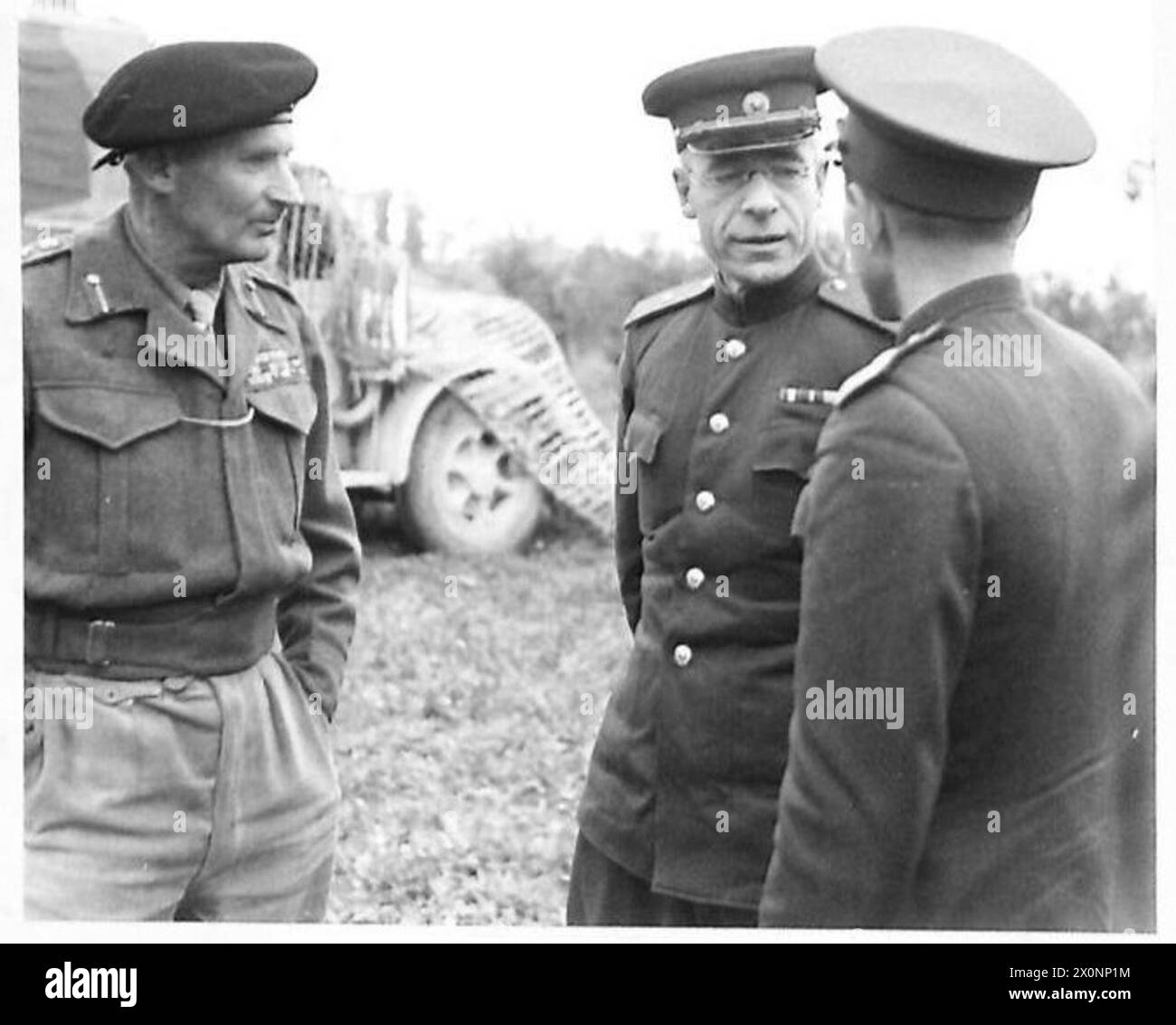 General Montgomery converses with two Major Generals during British ...