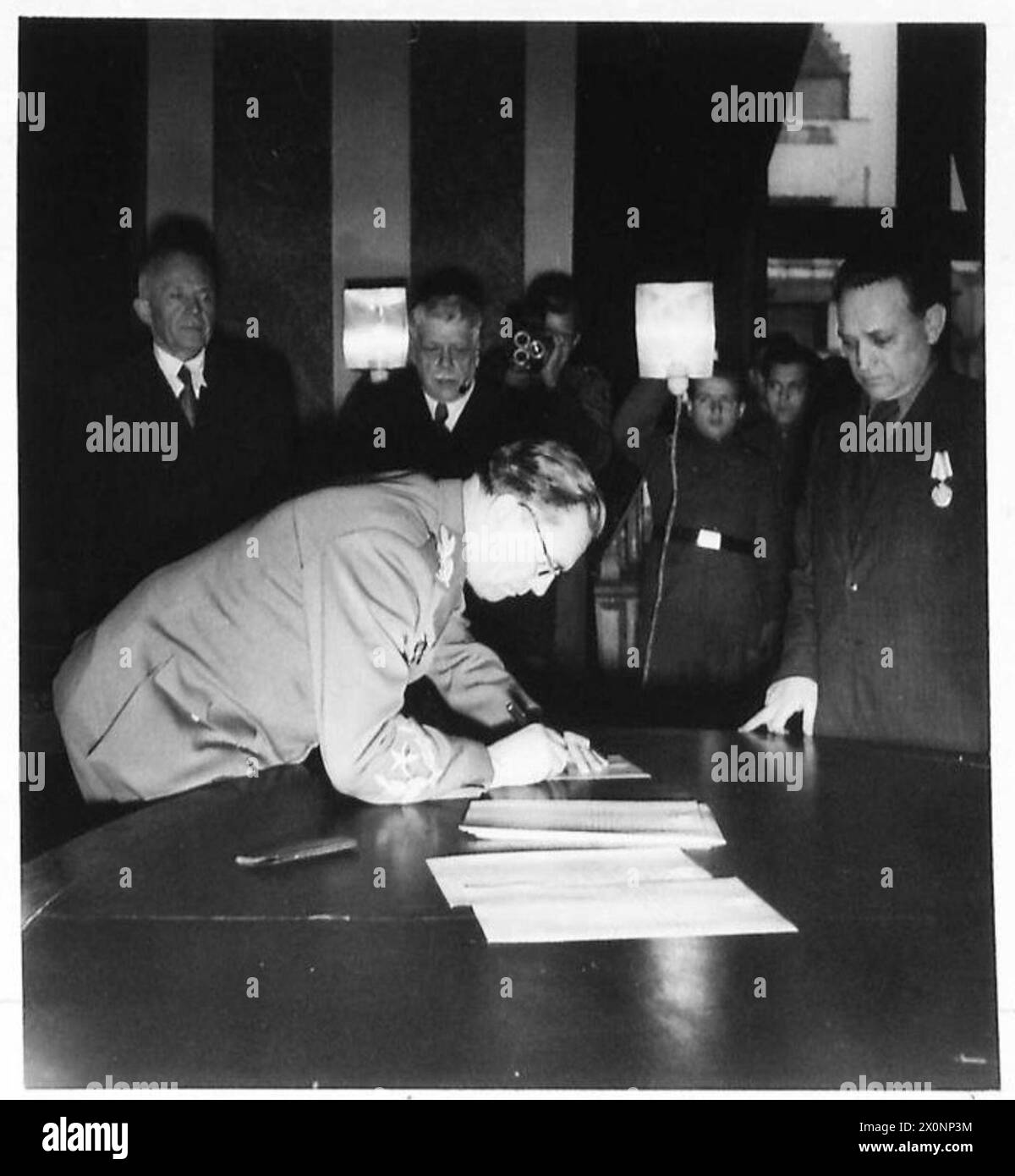 SWEARING IN OF YUGOSLAVIAN GOVERNMENT - Marshal Tito signs the oath ...