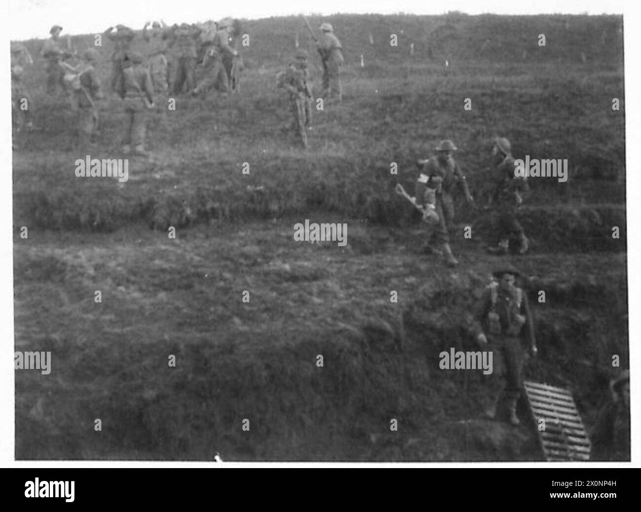 Infantry of the Eighth Army cross the Pakok bridge during an assault on ...