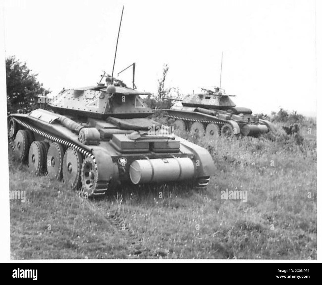 MARK V. CRUISER TANKS - Two of the tanks crashing through bushes ...
