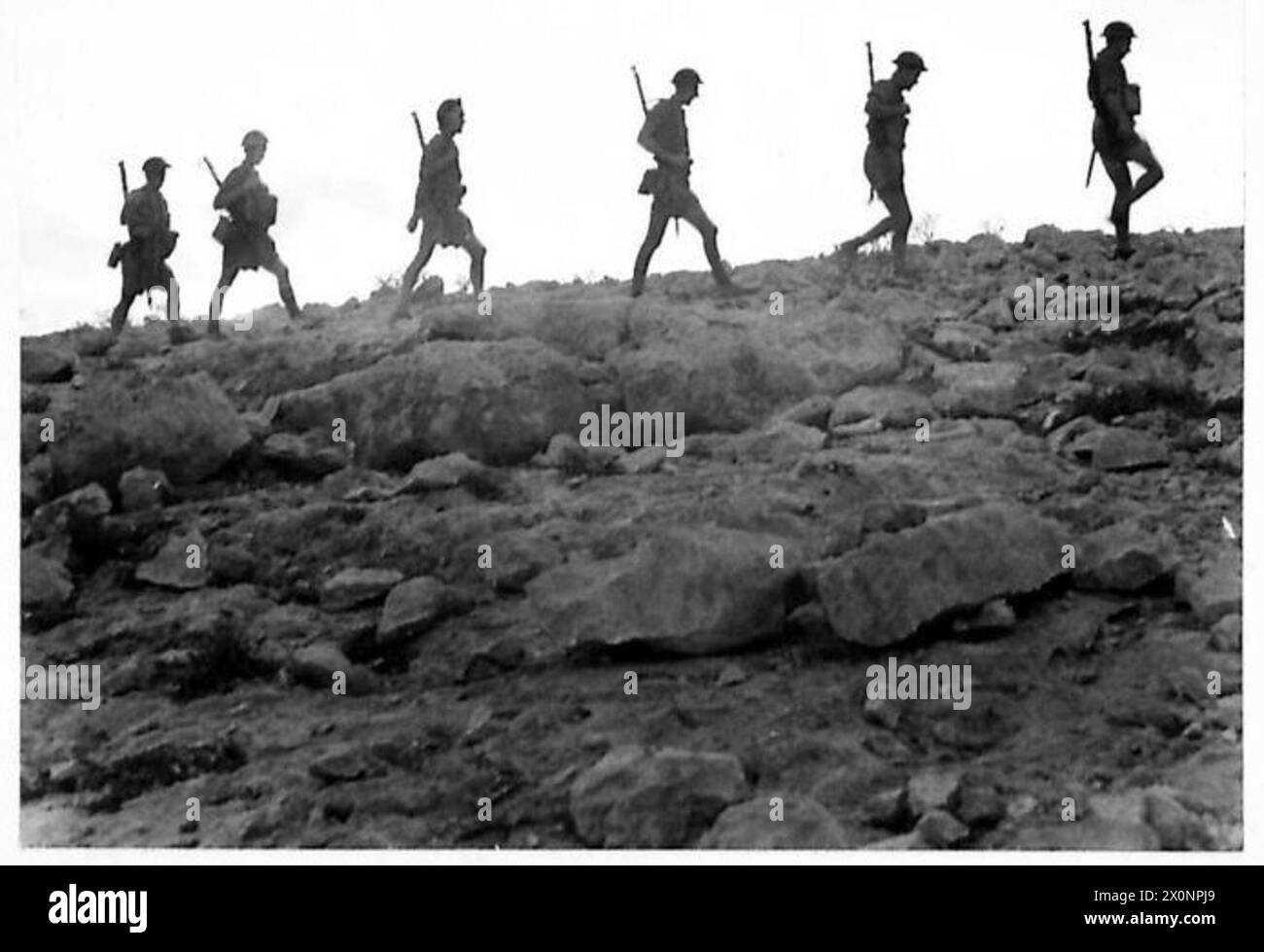 Photograph showing a patrol returning to their unit after conducting a ...