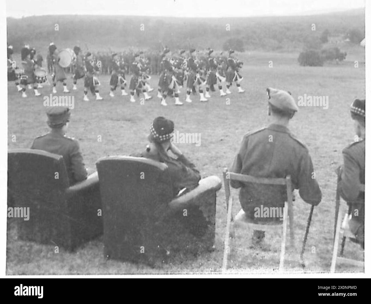 HRH The Princess Royal watches the Pipe Band of the Royal Scots ...