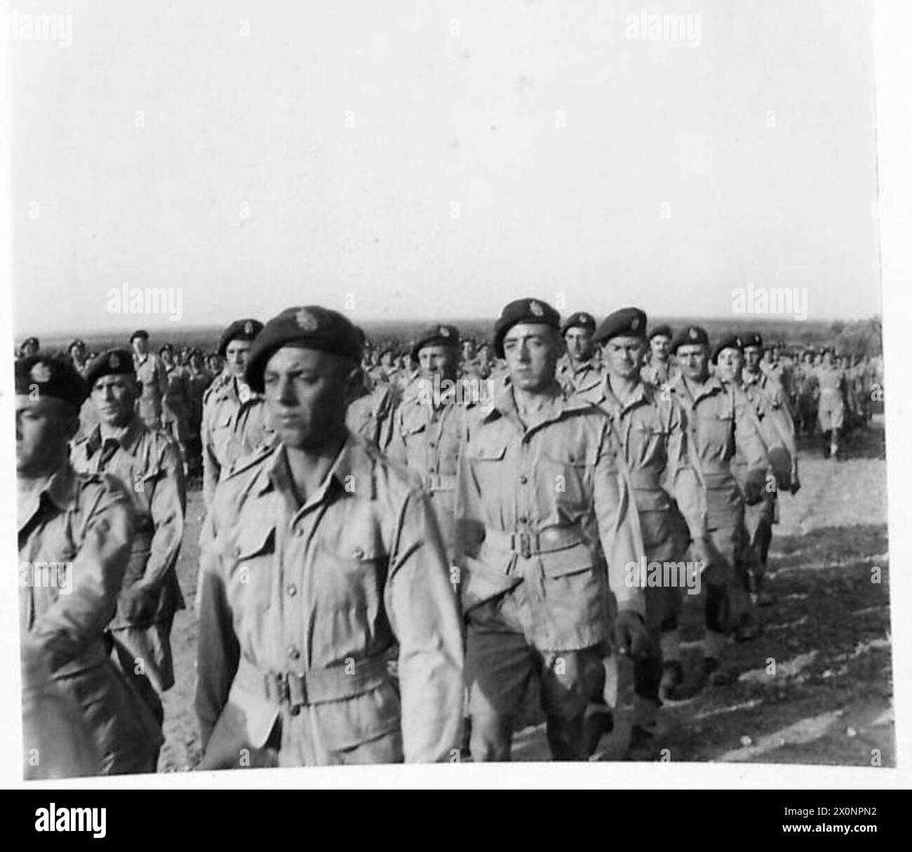 AIRBORNE TROOPS ATTEND CHURCH PARADE - Troops marching away after the ...