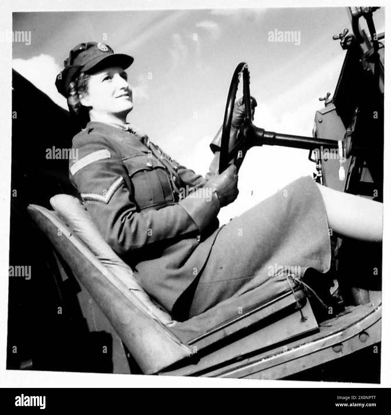 ATS driver operating a vehicle in convoy. Photographic negative ...