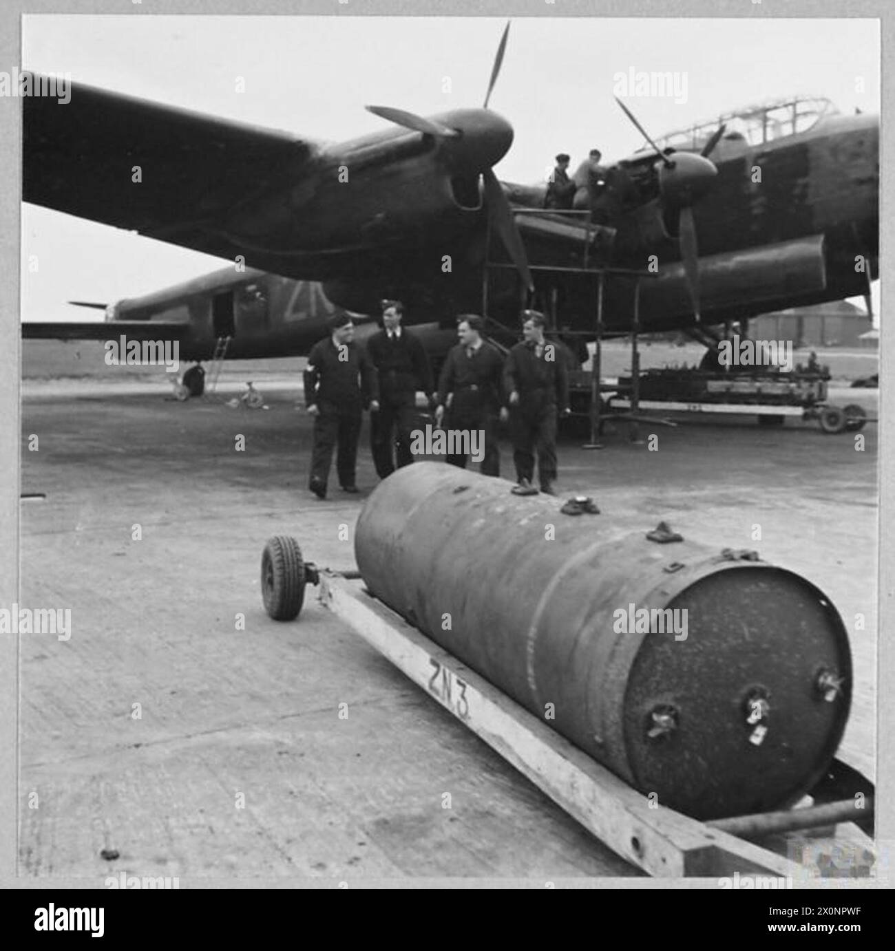Photograph showing a 4000 lb RAF 'Blockbuster' bomb being prepared for ...